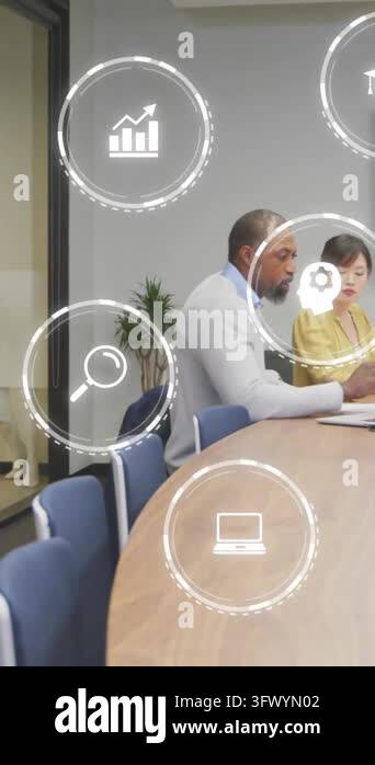 Animation of multiple digital icons against diverse businesspeople ...