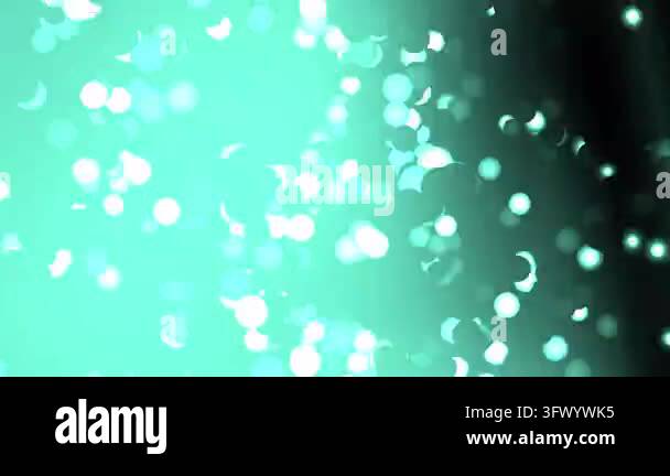 Abstract teal glowing spheres with light particles on a dark backdrop ...