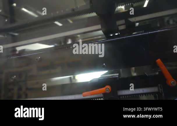 Close view through clear protective surface shows industrial equipment ...