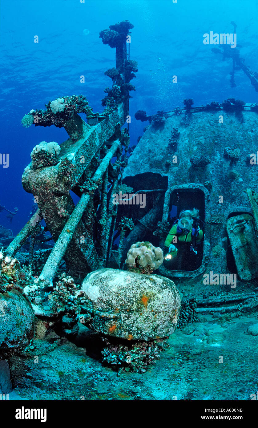 scuba diver explores unknown ship wreck Egypt Zabargad Zabarghad Red ...