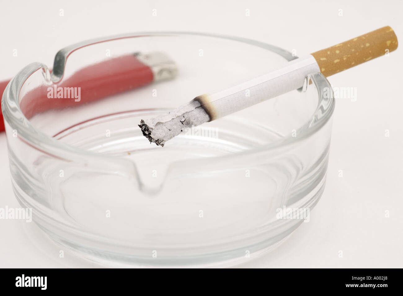 Ash tray and cigarette Stock Photo - Alamy