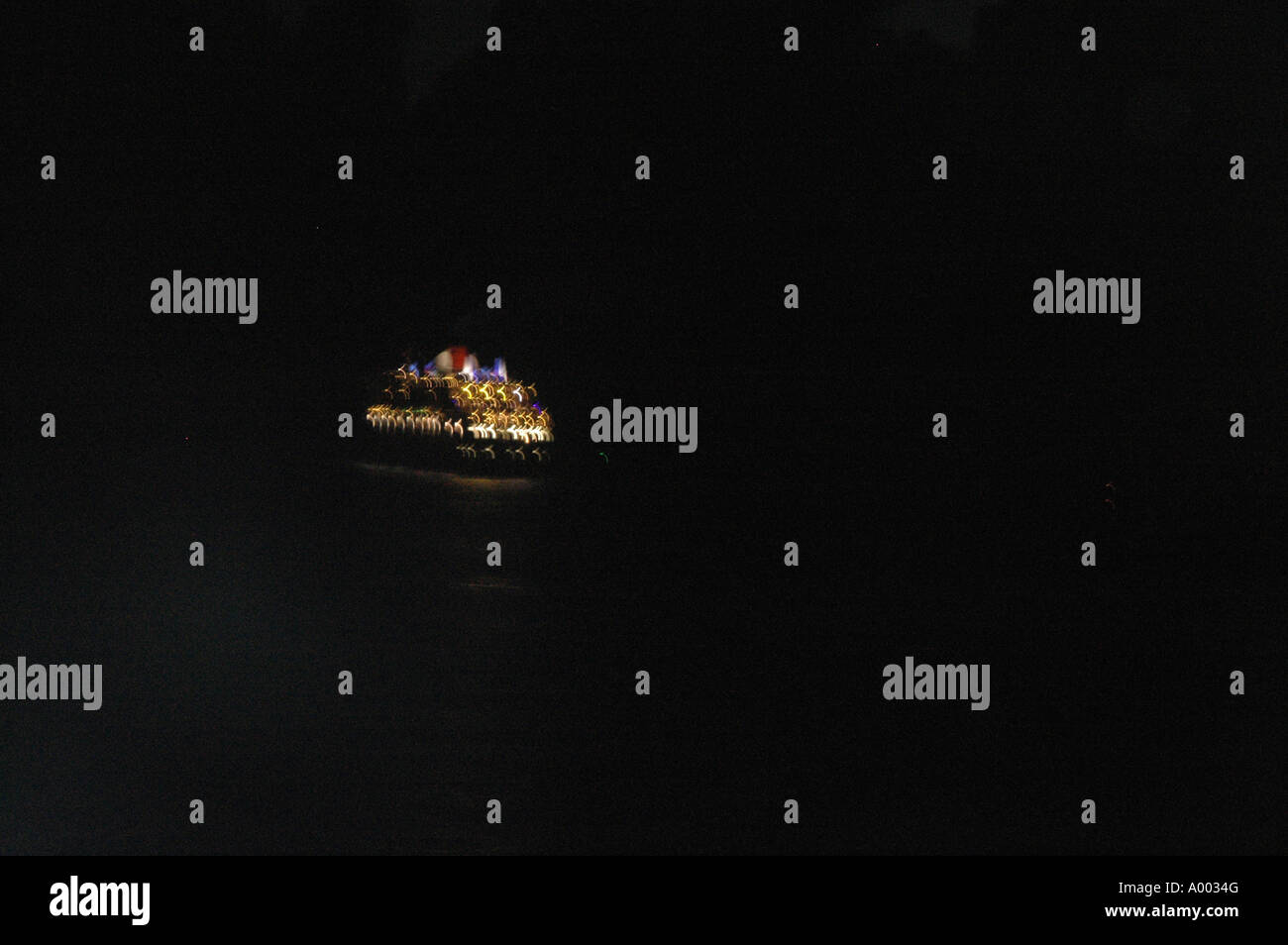 Lights of cruise ship at night Stock Photo - Alamy