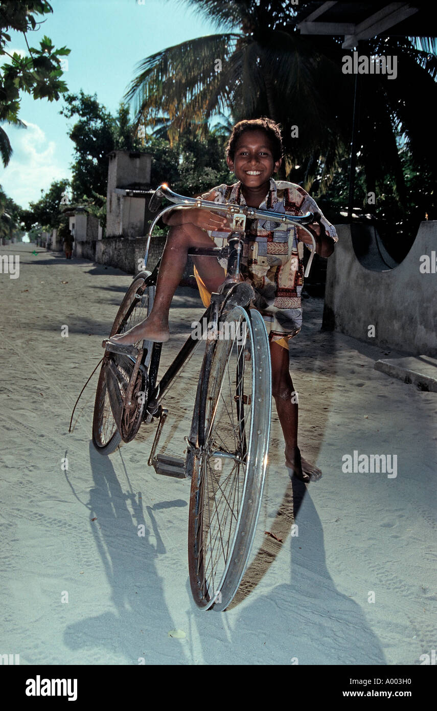 Maldivian child with bicycle Maldives Islands Indian Ozean Ari Atol ...