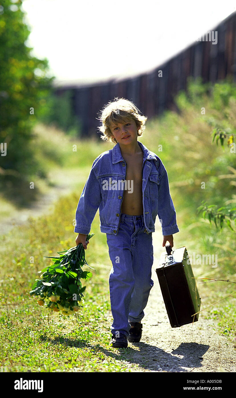 boy travelling by train to his girl Stock Photo - Alamy