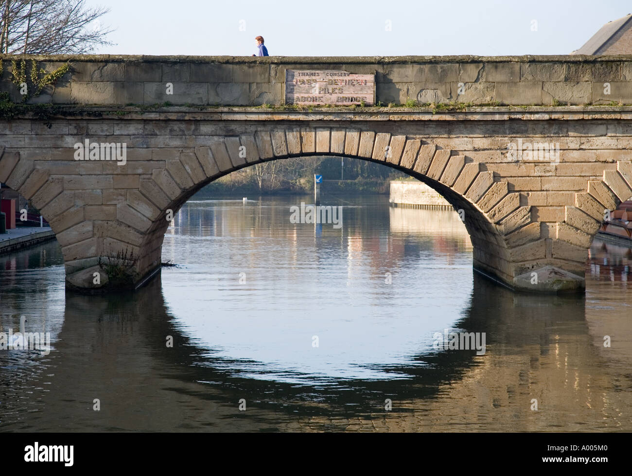 Jogger crossing Folly Bridge Oxford Stock Photo - Alamy