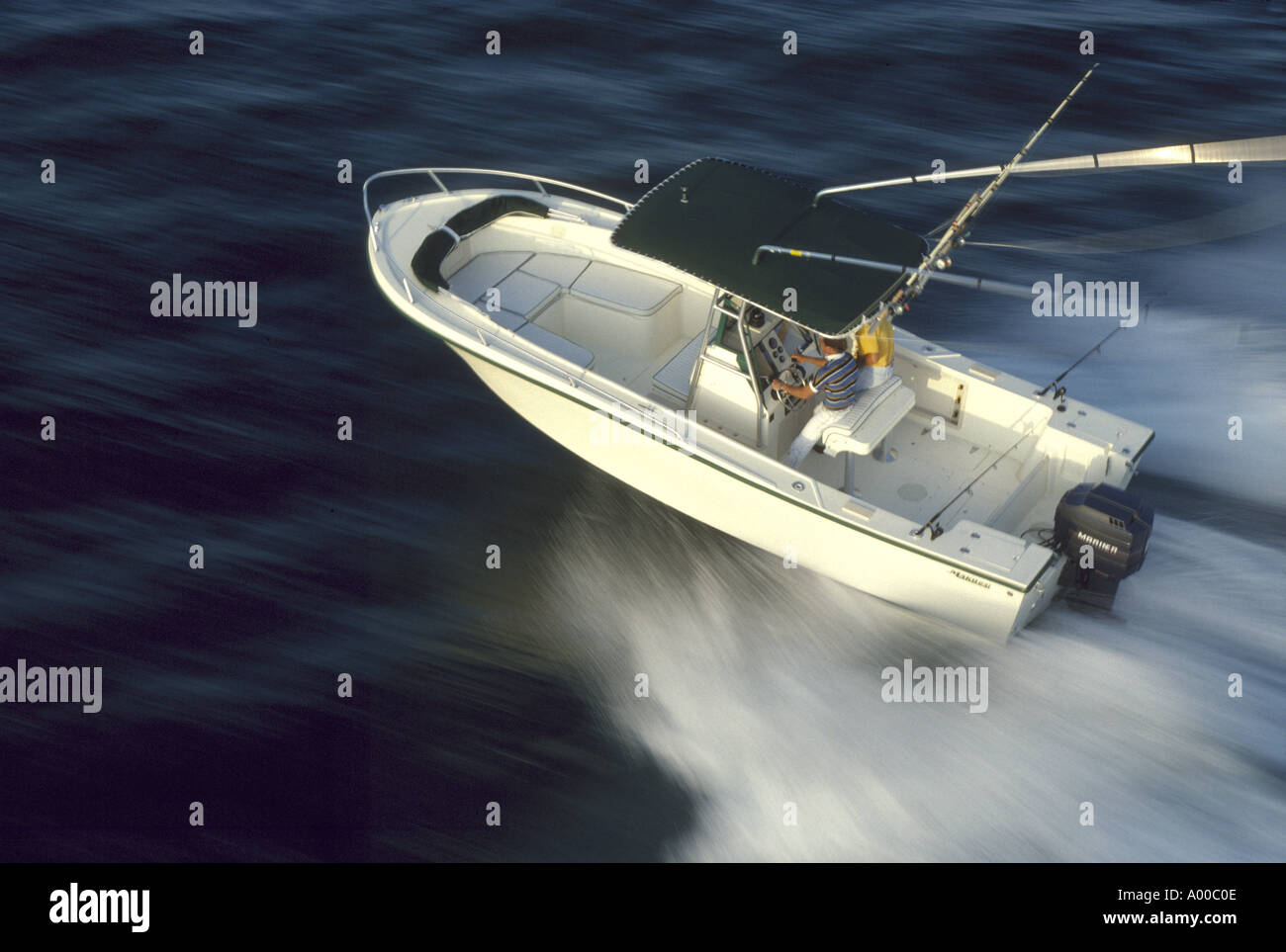 A speeding boat Stock Photo - Alamy