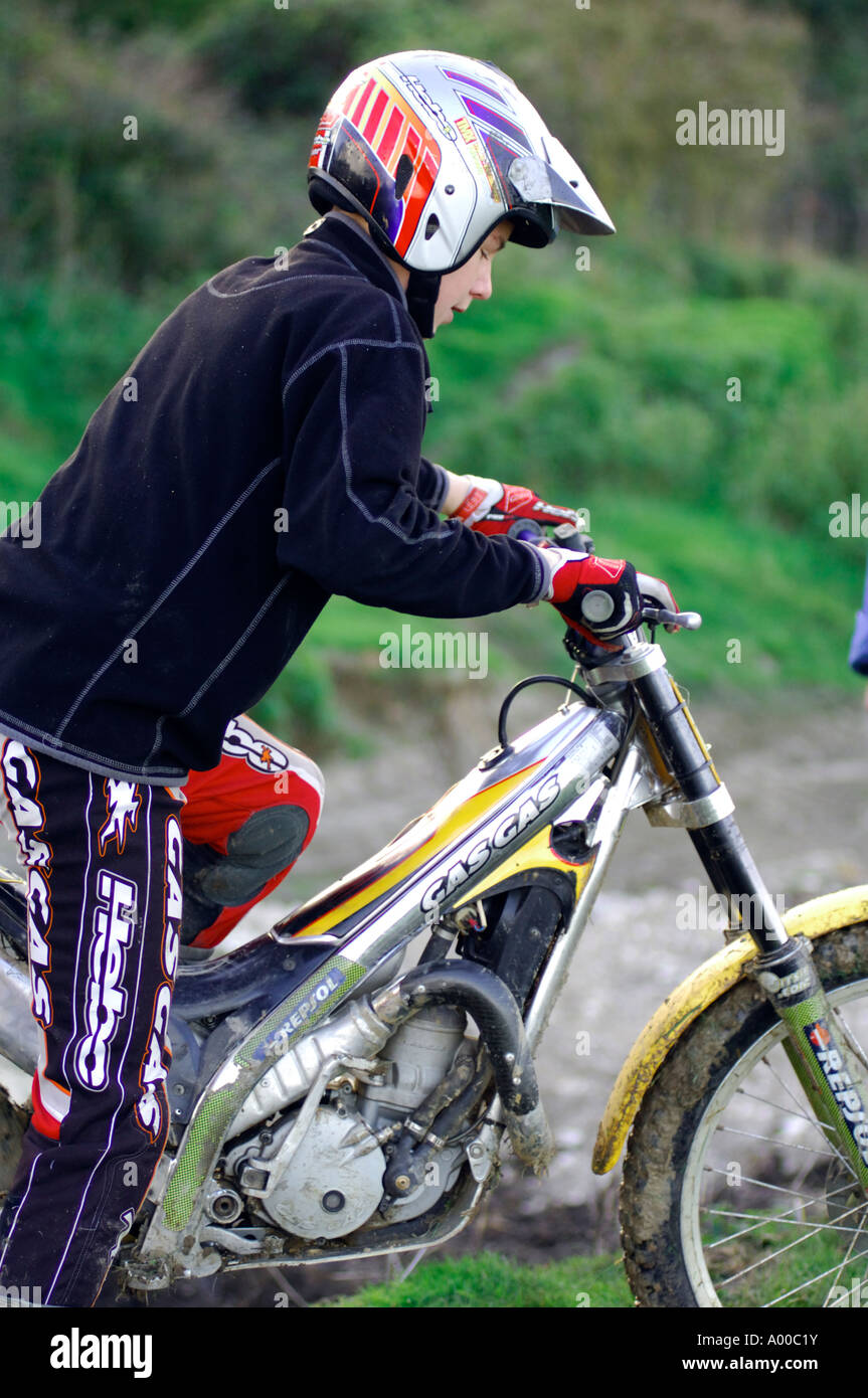 motorcycle trials rider negotiating tricky section of course on ...