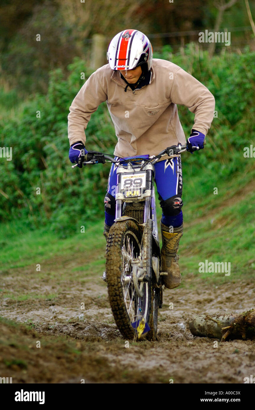motorcycle trials rider negotiating tricky section of course on ...