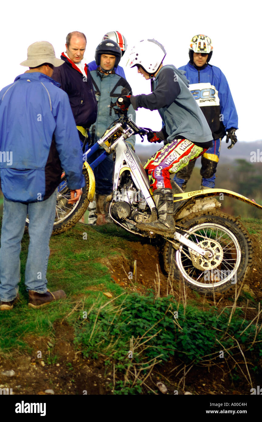 motorcycle trials rider negotiating tricky section of course on ...