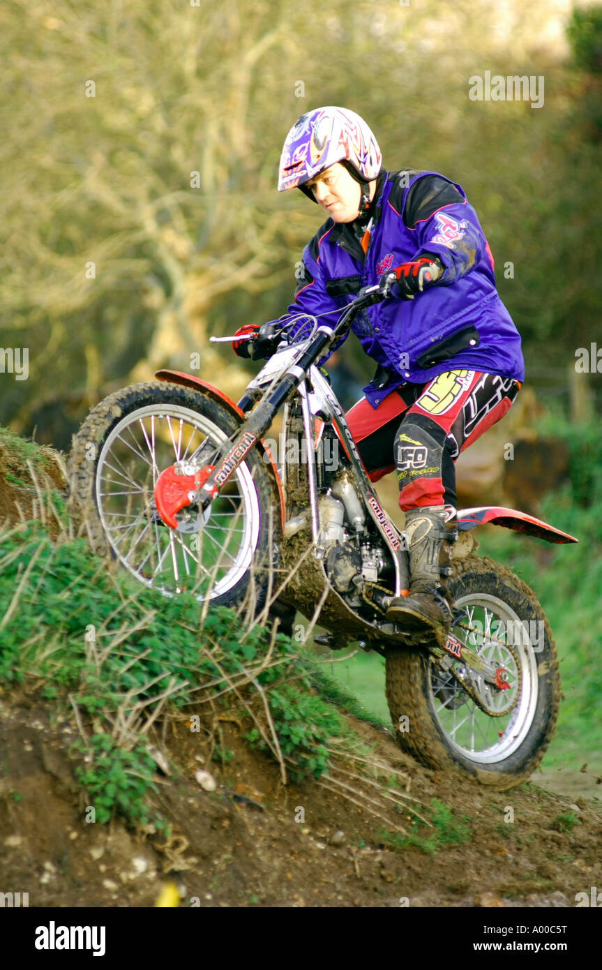 motorcycle trials rider negotiating tricky section of course on ...