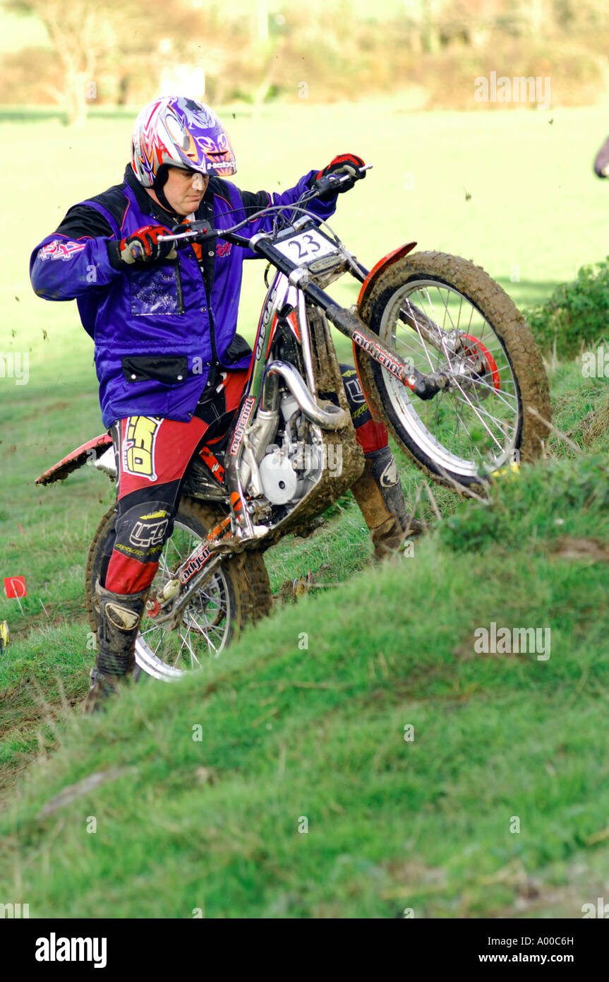 motorcycle trials rider negotiating tricky section of course on ...