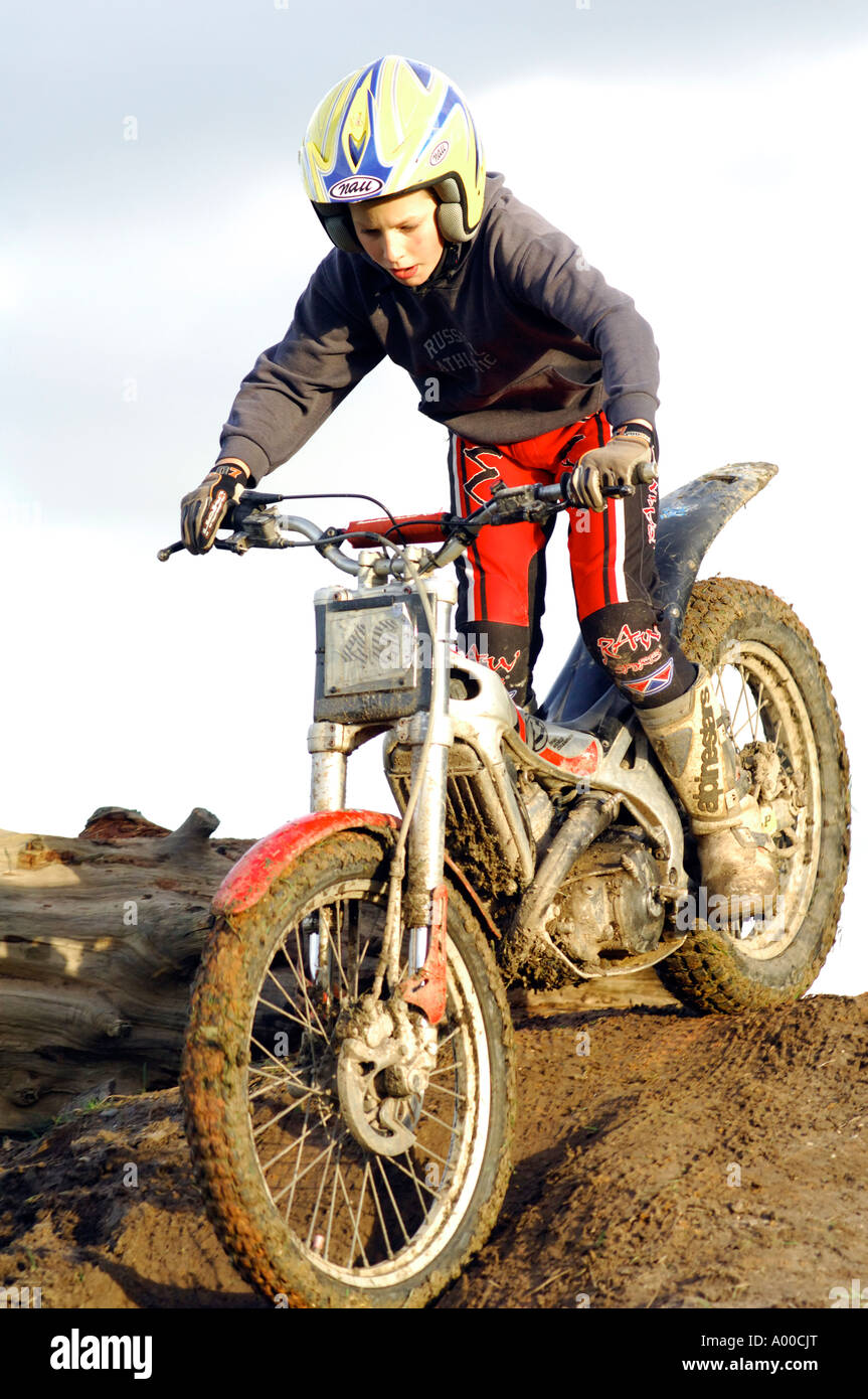 motorcycle trials rider negotiating tricky section of course on ...