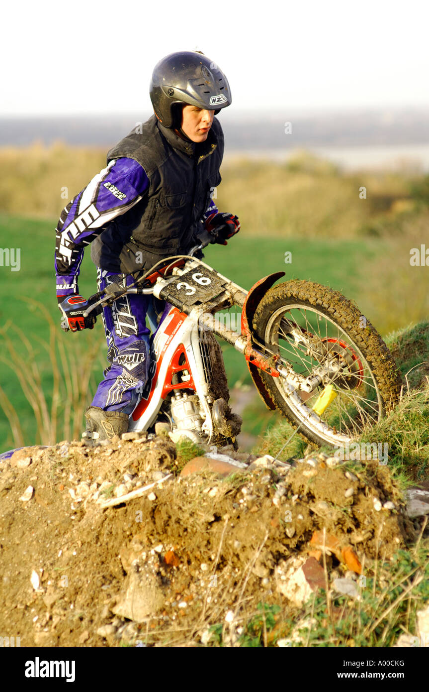 motorcycle trials rider negotiating tricky section of course on ...