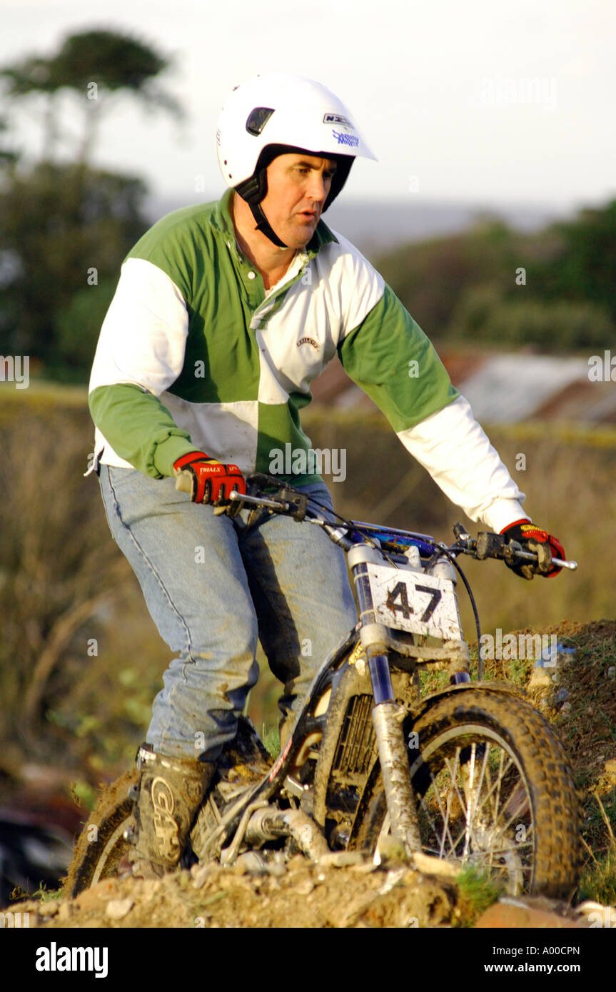 motorcycle trials rider negotiating tricky section of course on ...