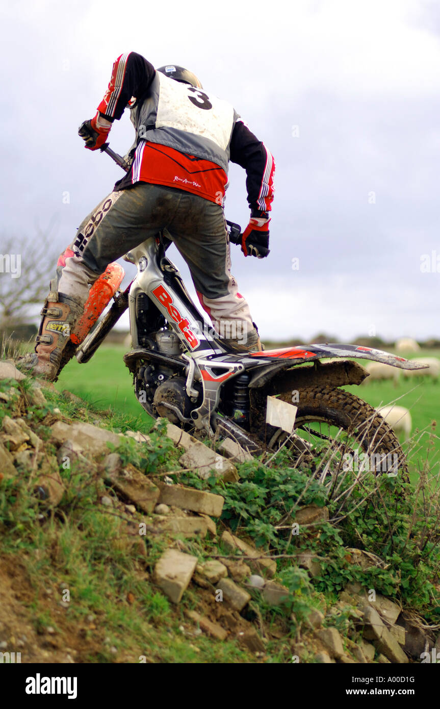 motorcycle trials rider negotiating tricky section of course on ...
