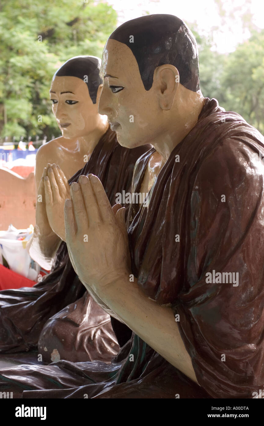 Statues showing Buddha disciple hearing first Buddha teachings in ...
