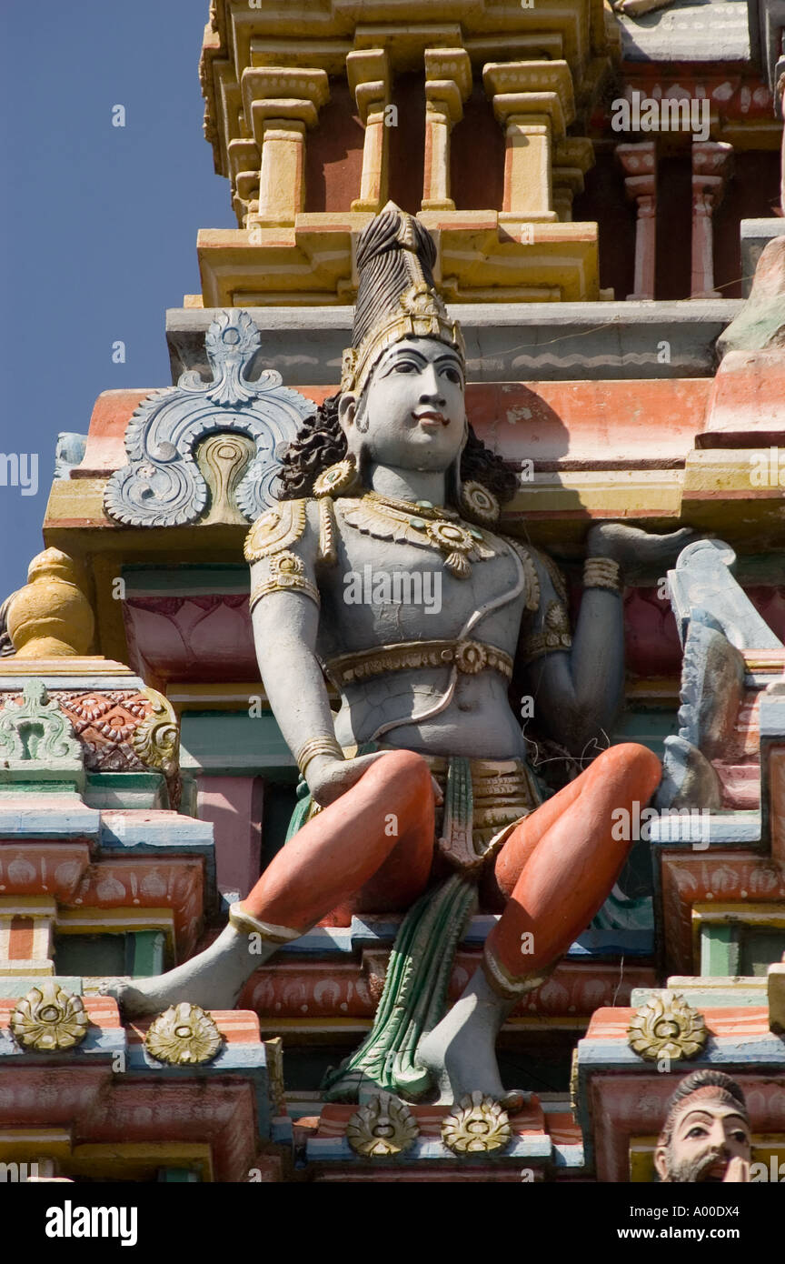 Close up of blue Hindu male deities statue at street temple in Varanasi Uttar Pradesh India ...