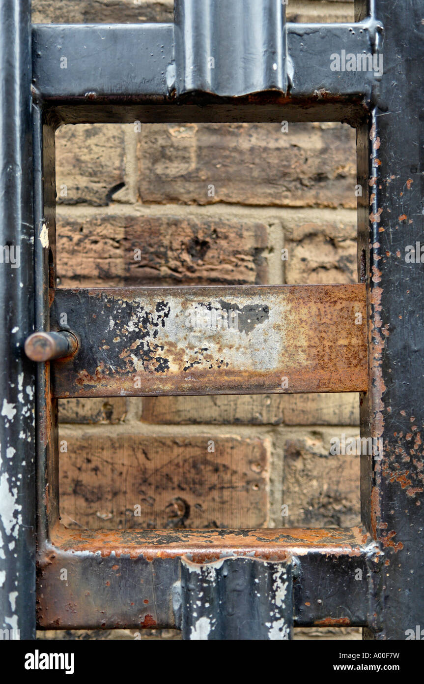 A Rusty Large Gate Bolt Photographed in Portrait View Stock Photo - Alamy