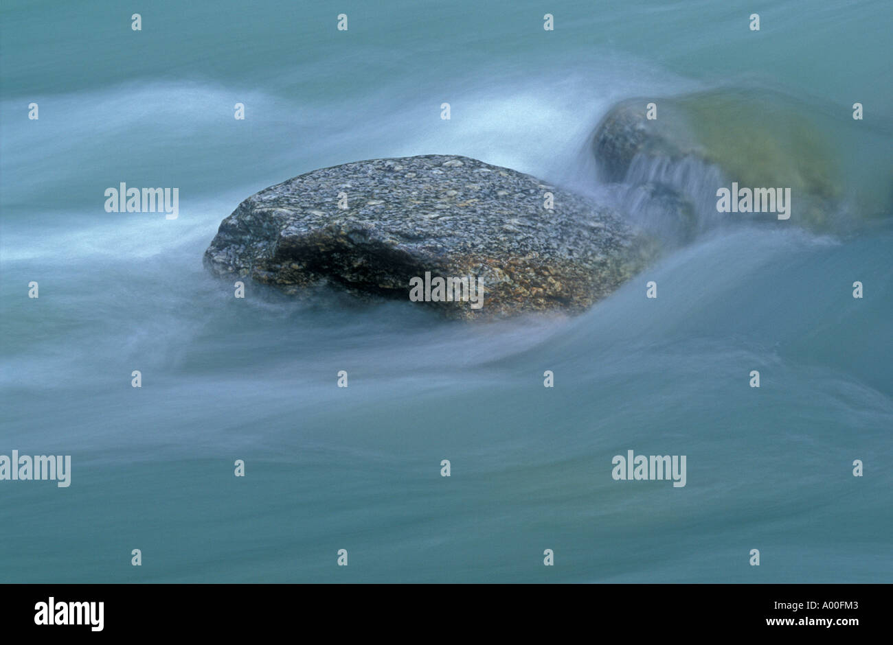 Granite rock in fast flowing stream Valsavaranche Italy Stock Photo - Alamy