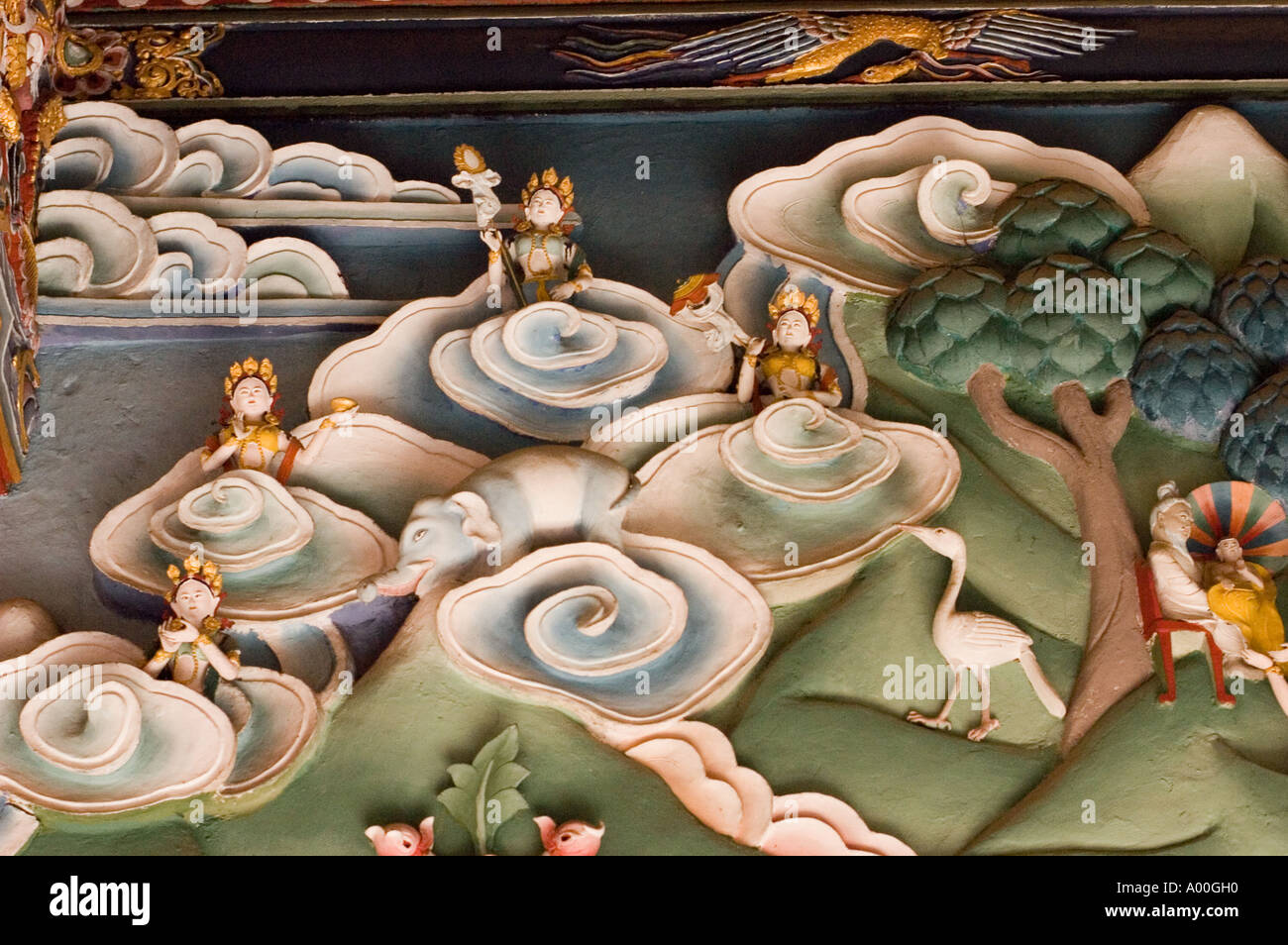 Buddhist heaven bas relief in Royal Bhutanese Monastery Bodhgaya Bihar ...