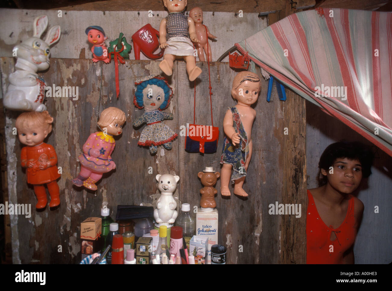 Favela Brazil inside slum house childrens dolls pinned to the wooden ...