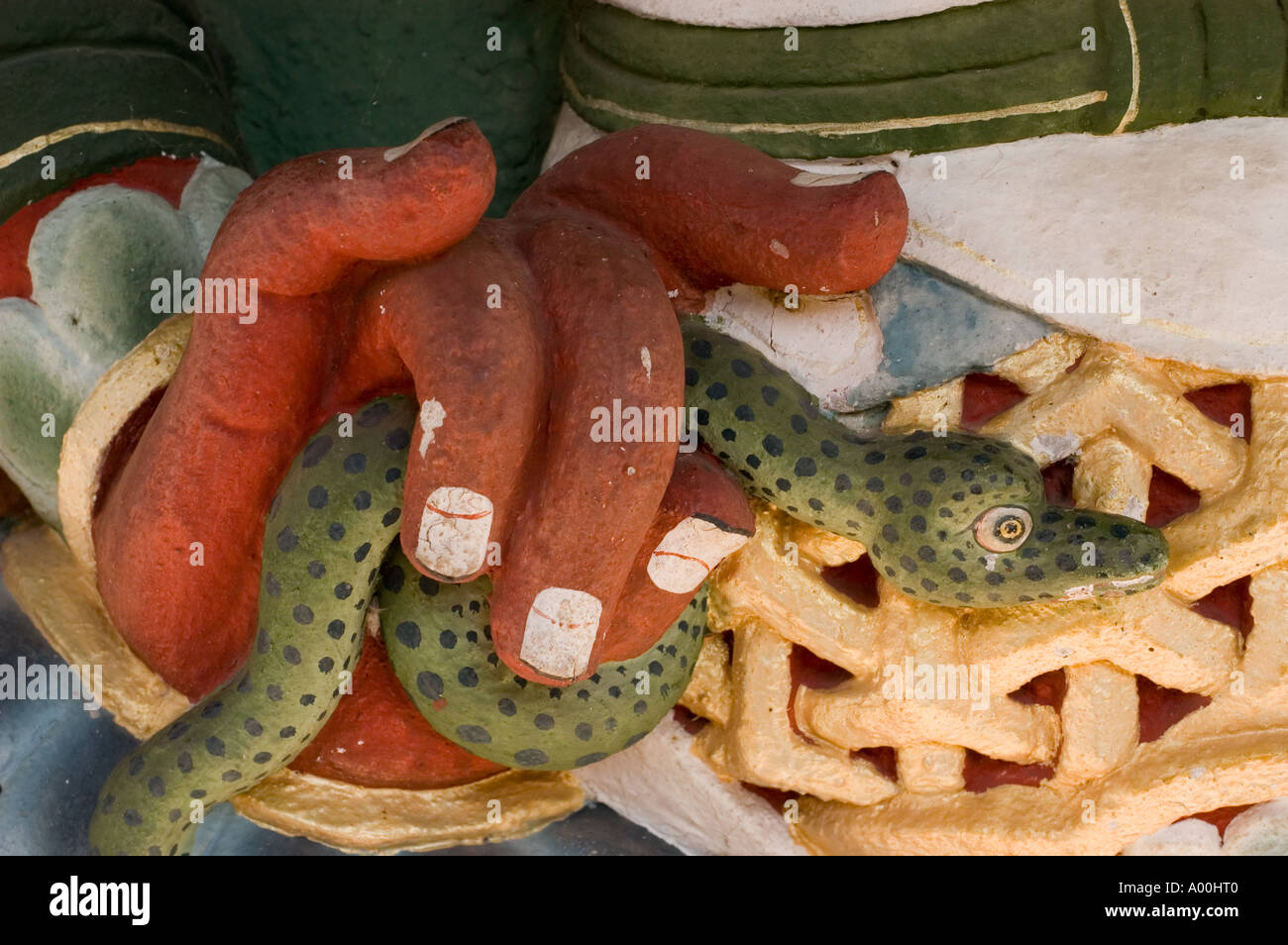 Close up of hand of Virupaksha holding snake Royal Bhutanese Monastery ...