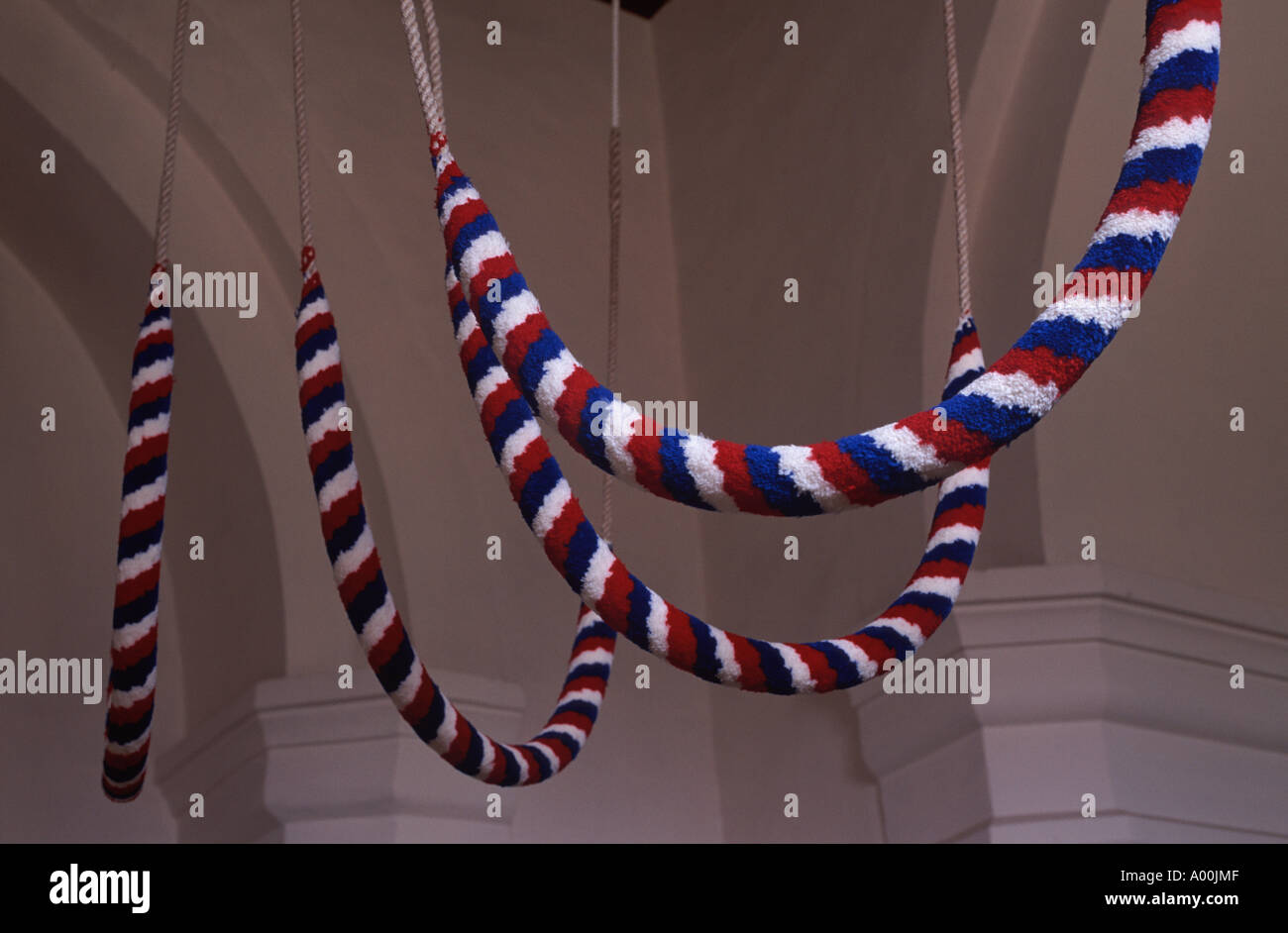 Four bell pulls hanging in the bell tower of St Margarets Church ...