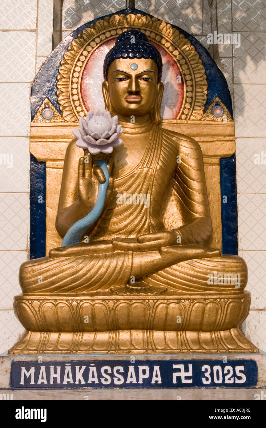 Golden statue of Buddha disciple Mahakassapa at Mahabodhi Mahavihara ...