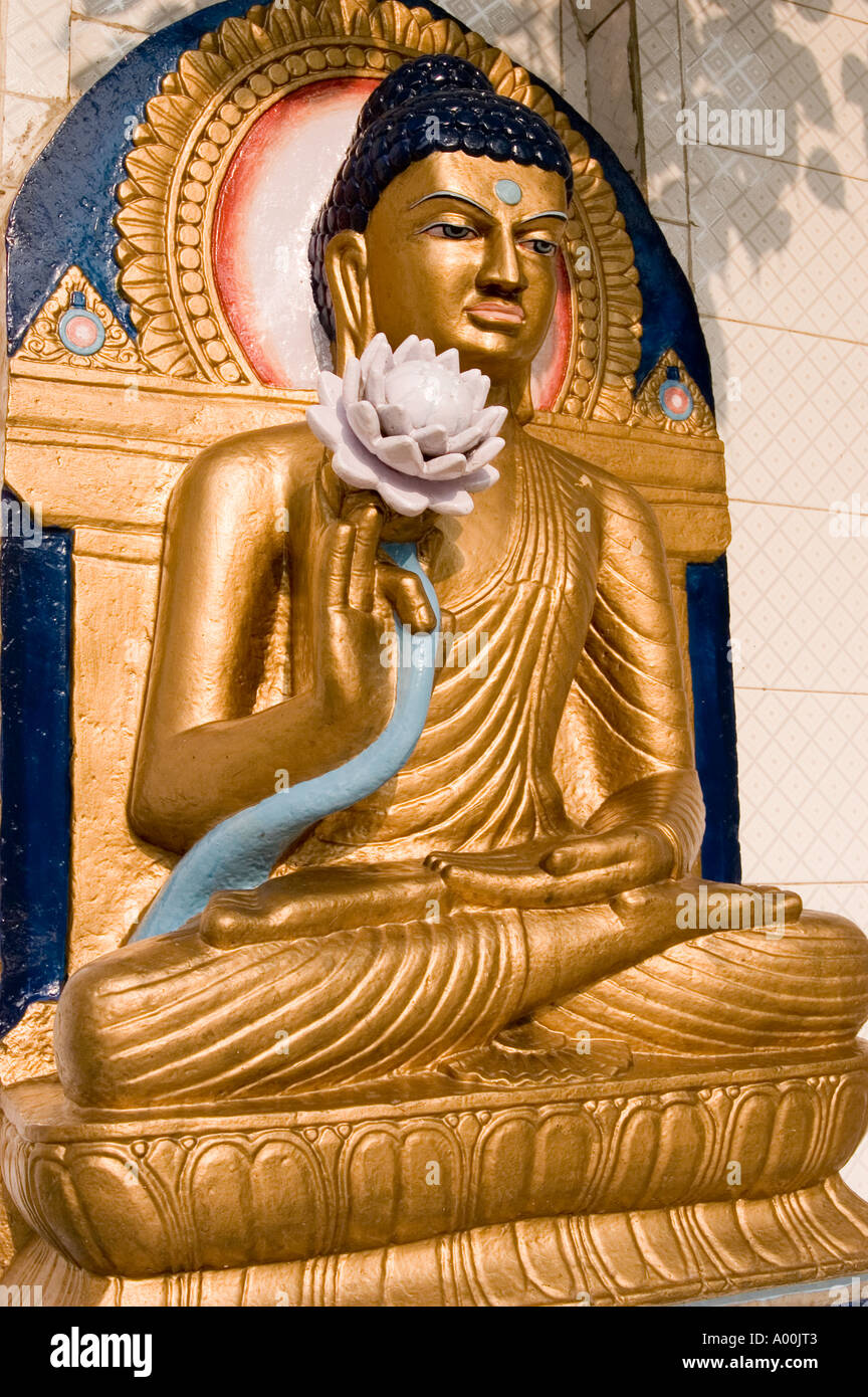 Golden statue of Buddha disciple Mahakassapa at Mahabodhi Mahavihara ...