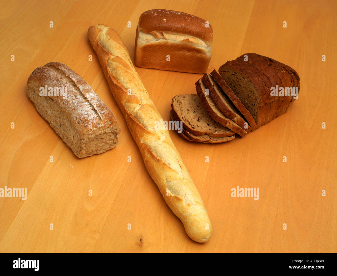 Variety of Bread White Batch Sliced Granary and Baguette Stock Photo ...