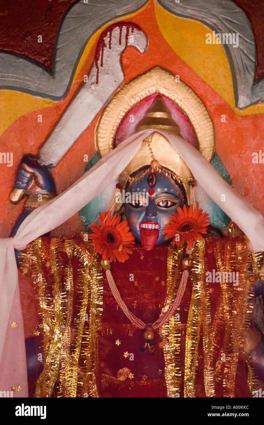 Statue of Durga Kali emanation Hindu goddess with blue skin and red ...