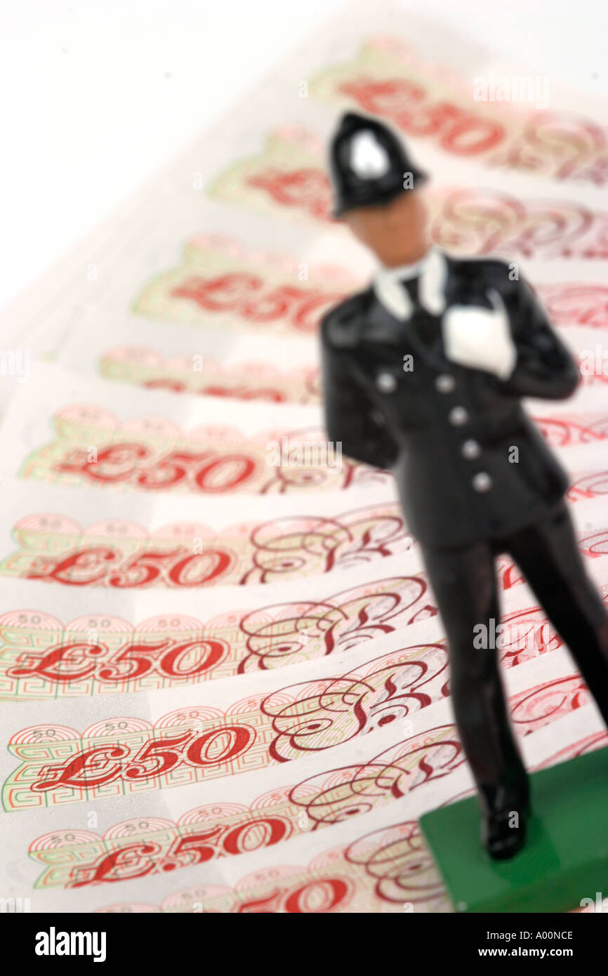 London policeman and money Stock Photo - Alamy