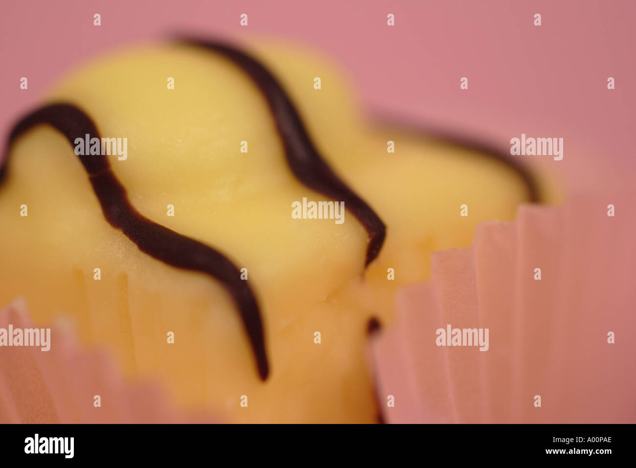 french fancy cake in pink and yellow Stock Photo - Alamy