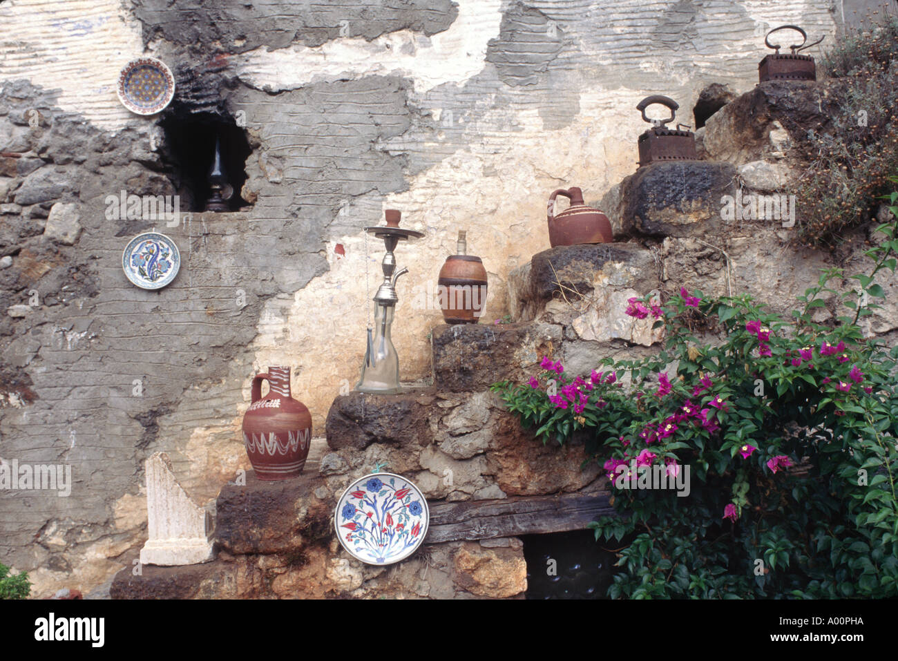 Turkish artifacts on steps in KAYA KOY Village TURQUOISE COAST TURKEY ...