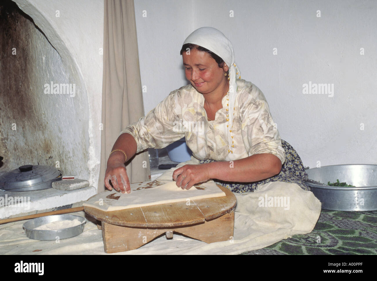 Turkish woman prepare a typical meal in the village of BEZIRGAN TURKEY ...