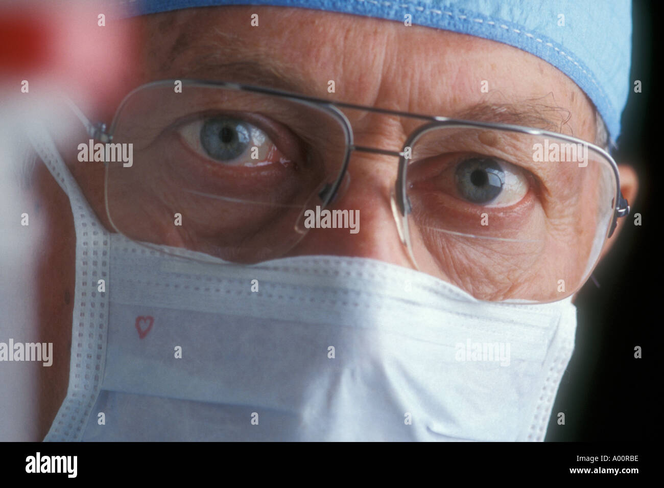 doctor examining patient with red laser light beam Stock Photo - Alamy