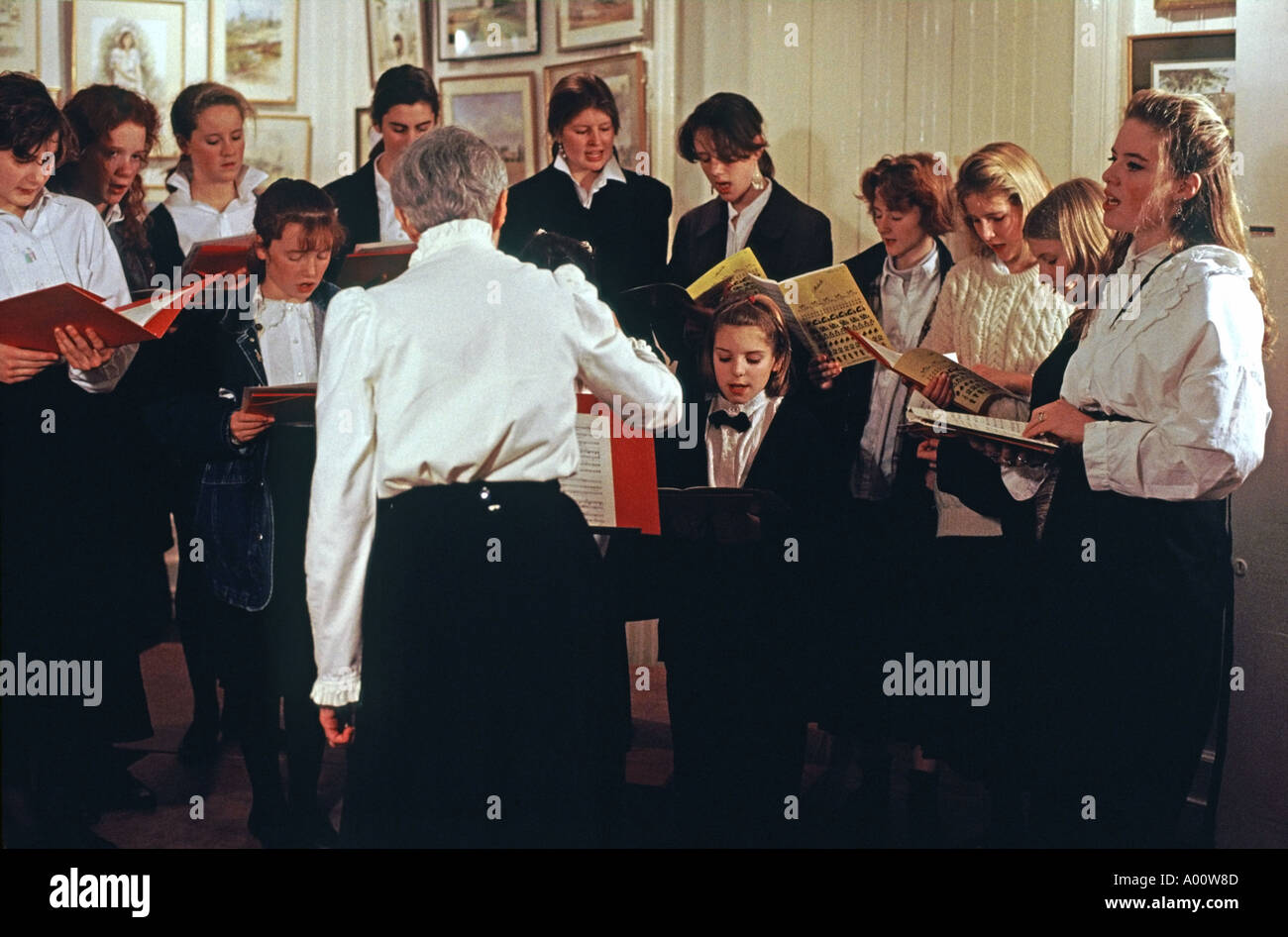 conductor conducting choir Stock Photo - Alamy