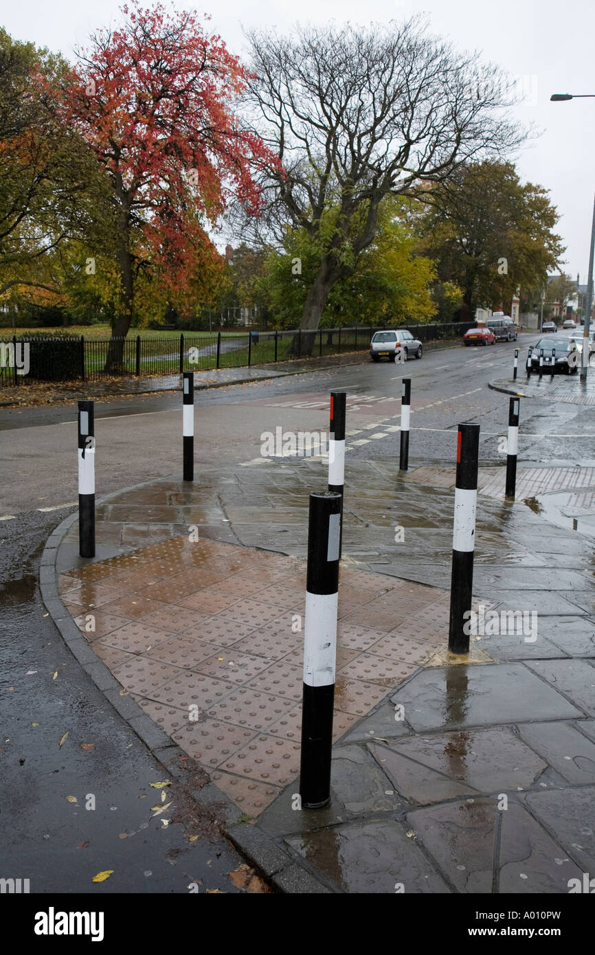 Slippery pavement with aids for blind person crossing road Cardiff ...