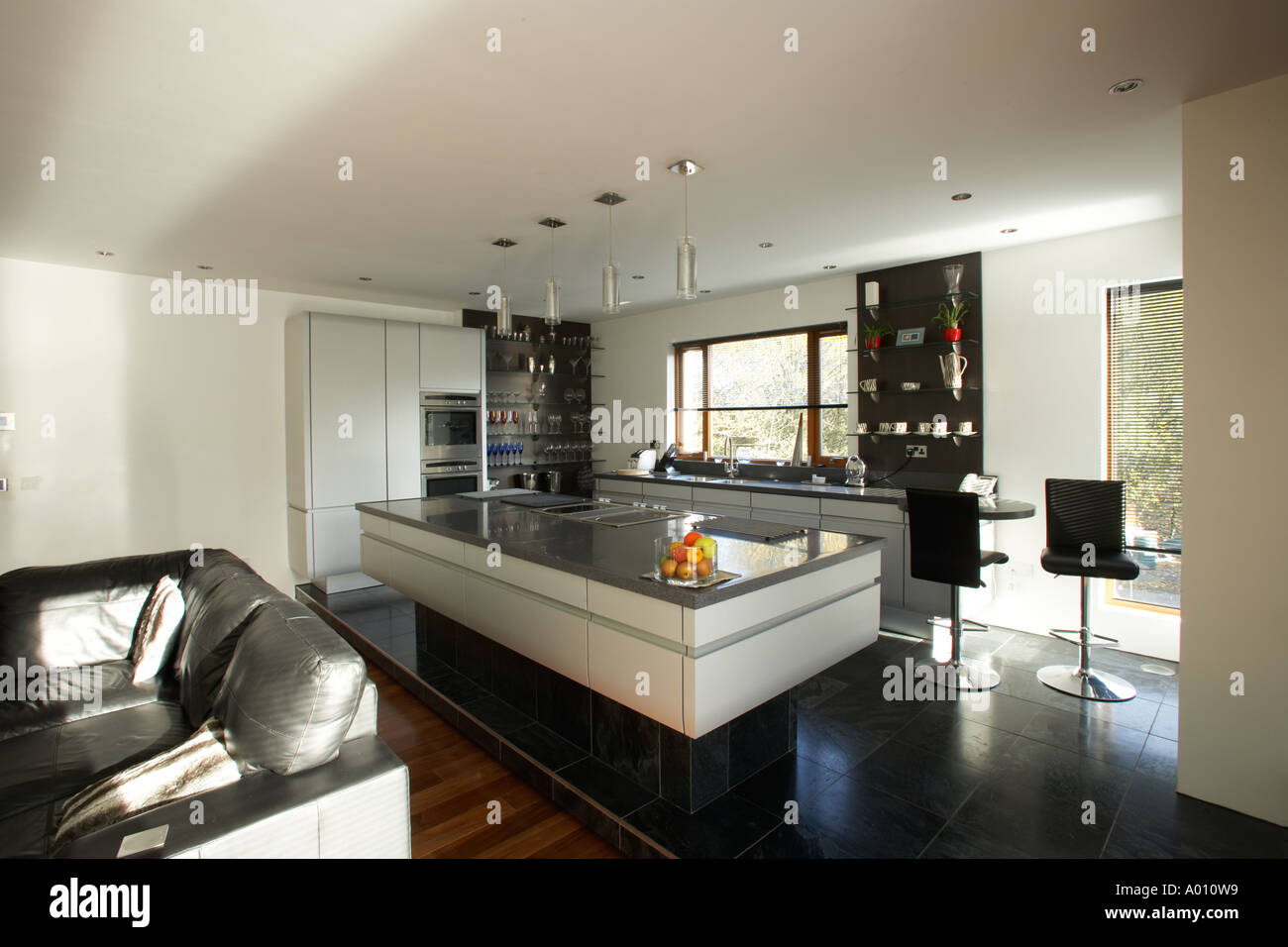 kitchen with central food preparation area in modern house Stock Photo ...