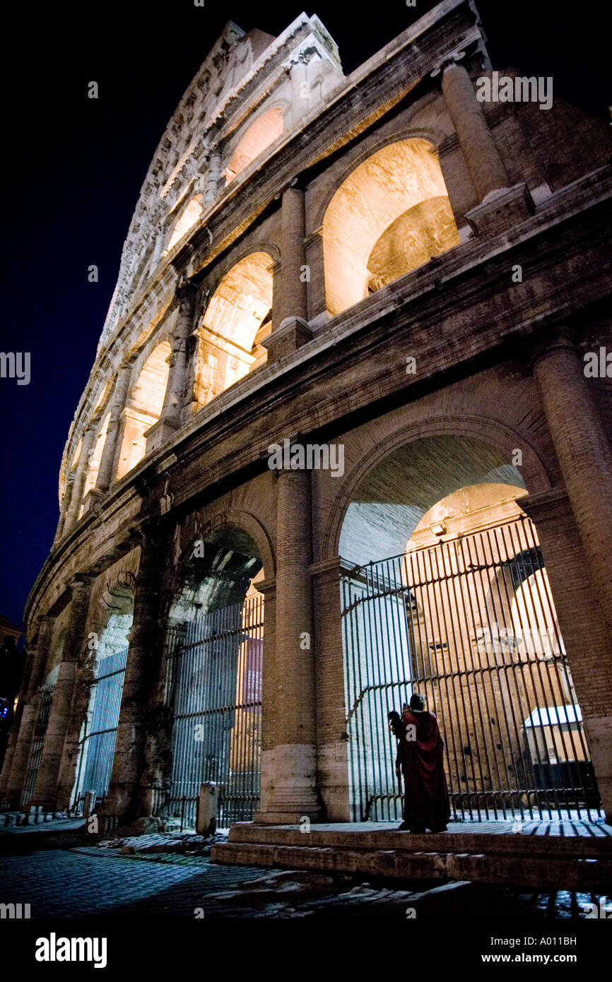 Two roman guards in costume by the Colosseum in Rome, Italy Stock Photo ...