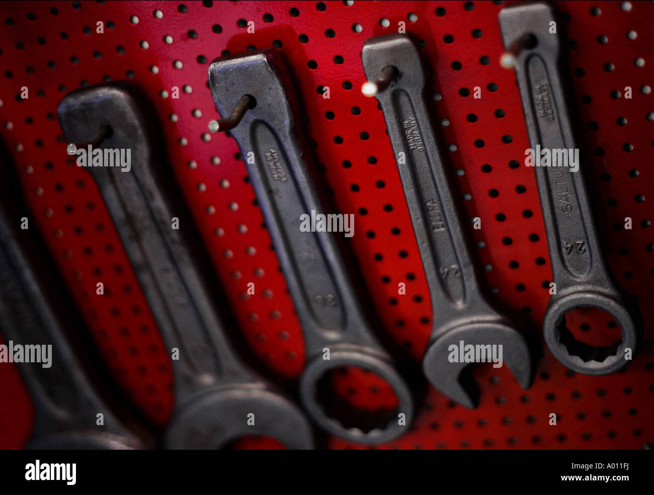 Tools hanging on a wall Stock Photo - Alamy