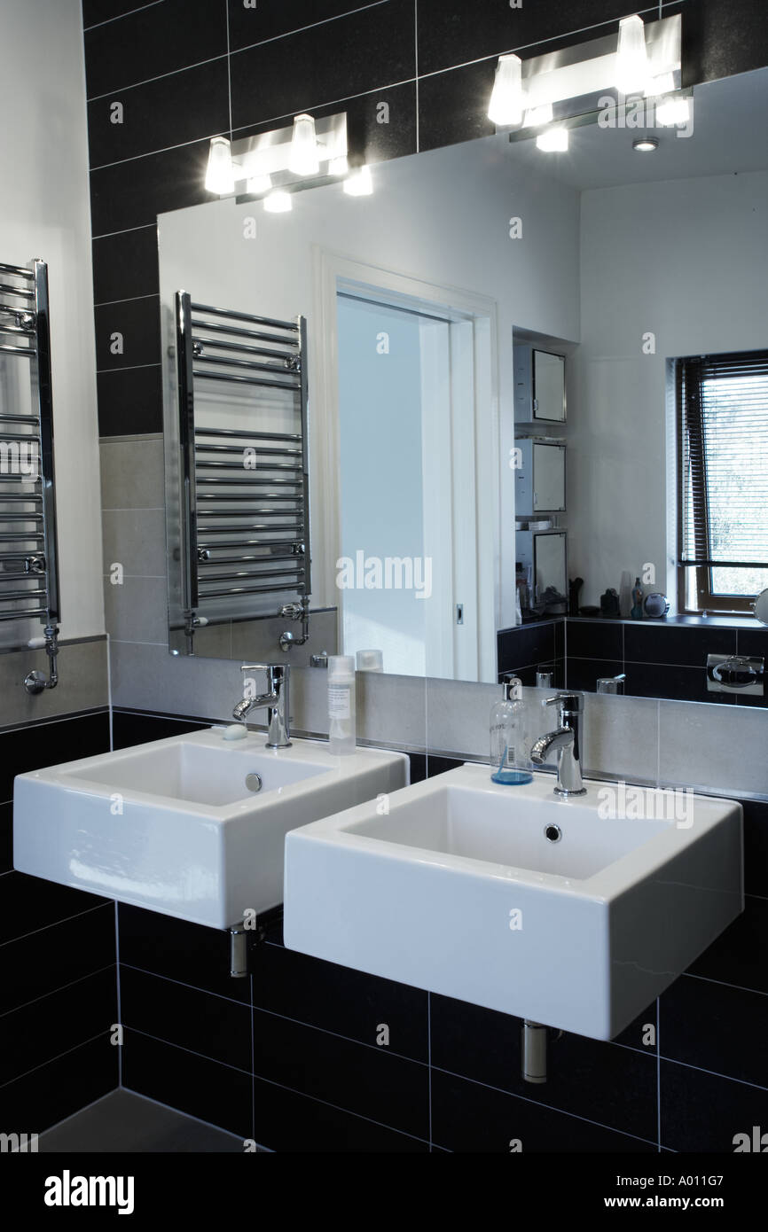 wash basins in modern en suite bathroom Stock Photo - Alamy