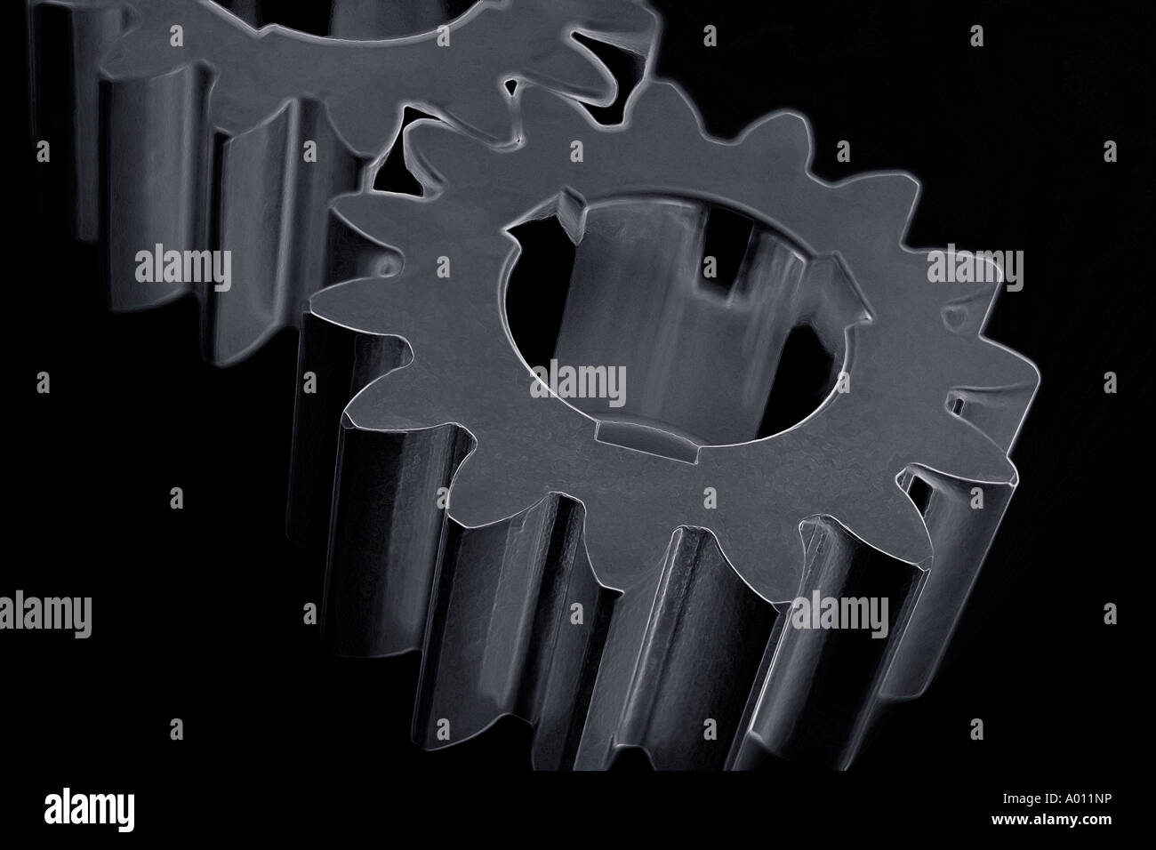 Silver gear wheels on black background Stock Photo - Alamy