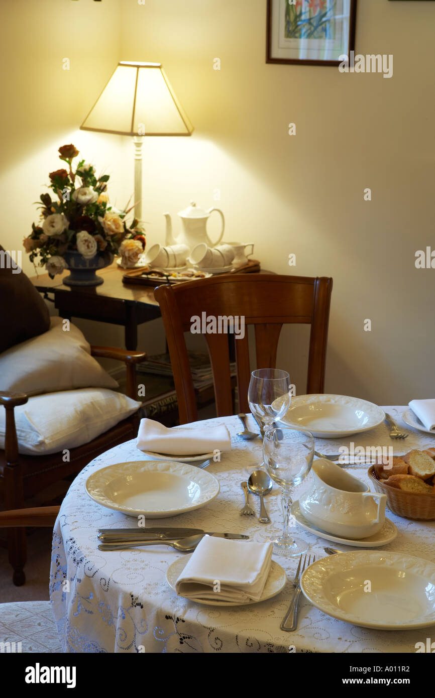 Table laid out for dinner with Staffordshire Chinaware Stock Photo - Alamy