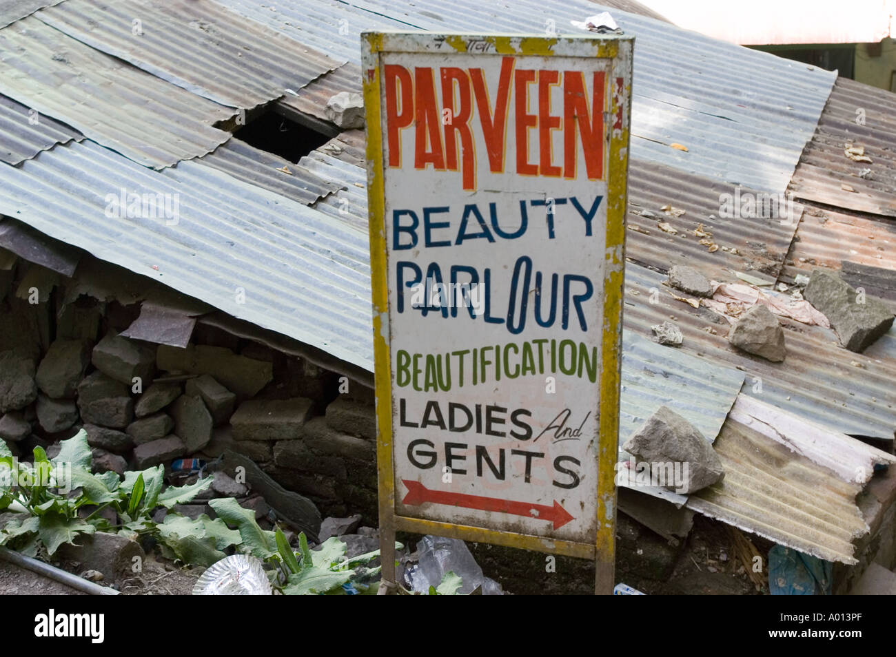Parveen beauty parlour sign with mess in background Dharamsala Himachal ...