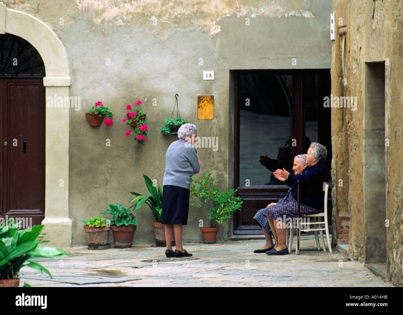Italian women gossip in the RENAISSANCE town of PIENZA TUSCANY ITALY ...