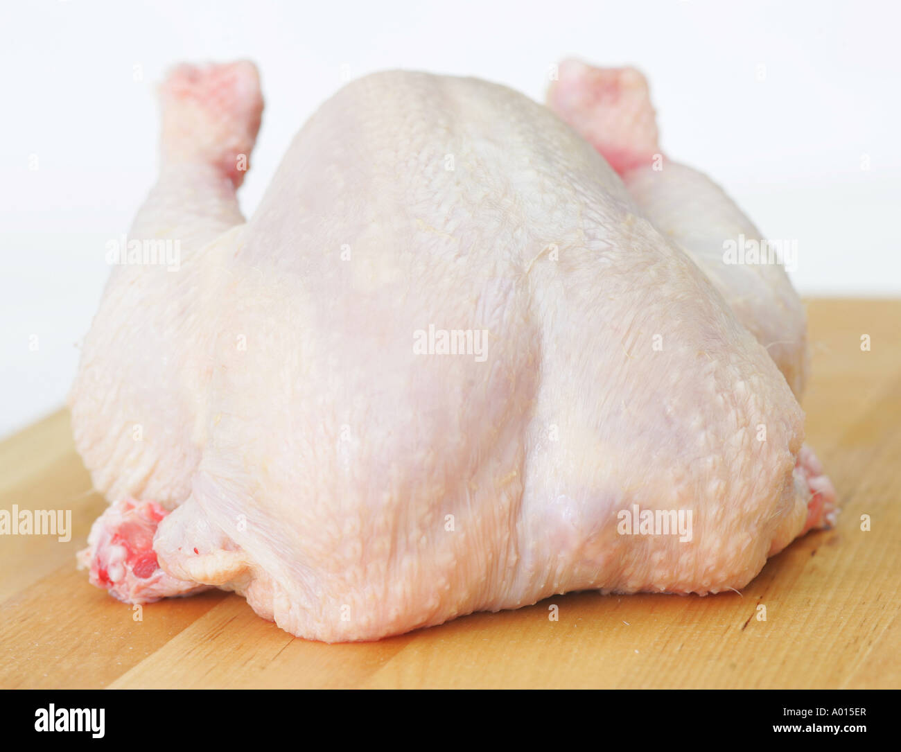 Whole raw chicken Stock Photo - Alamy