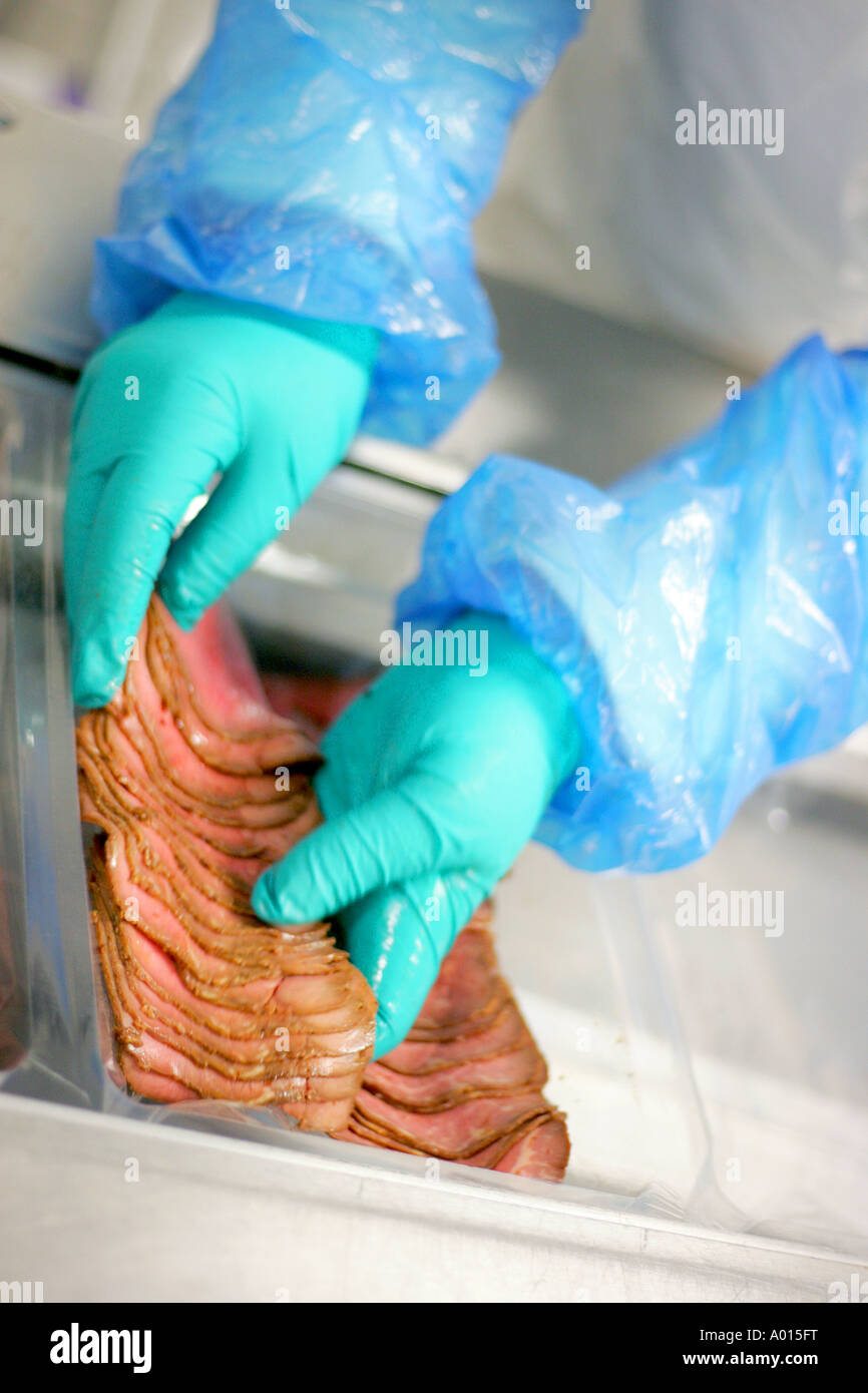Meat packing plant, packing of roast beef Stock Photo - Alamy