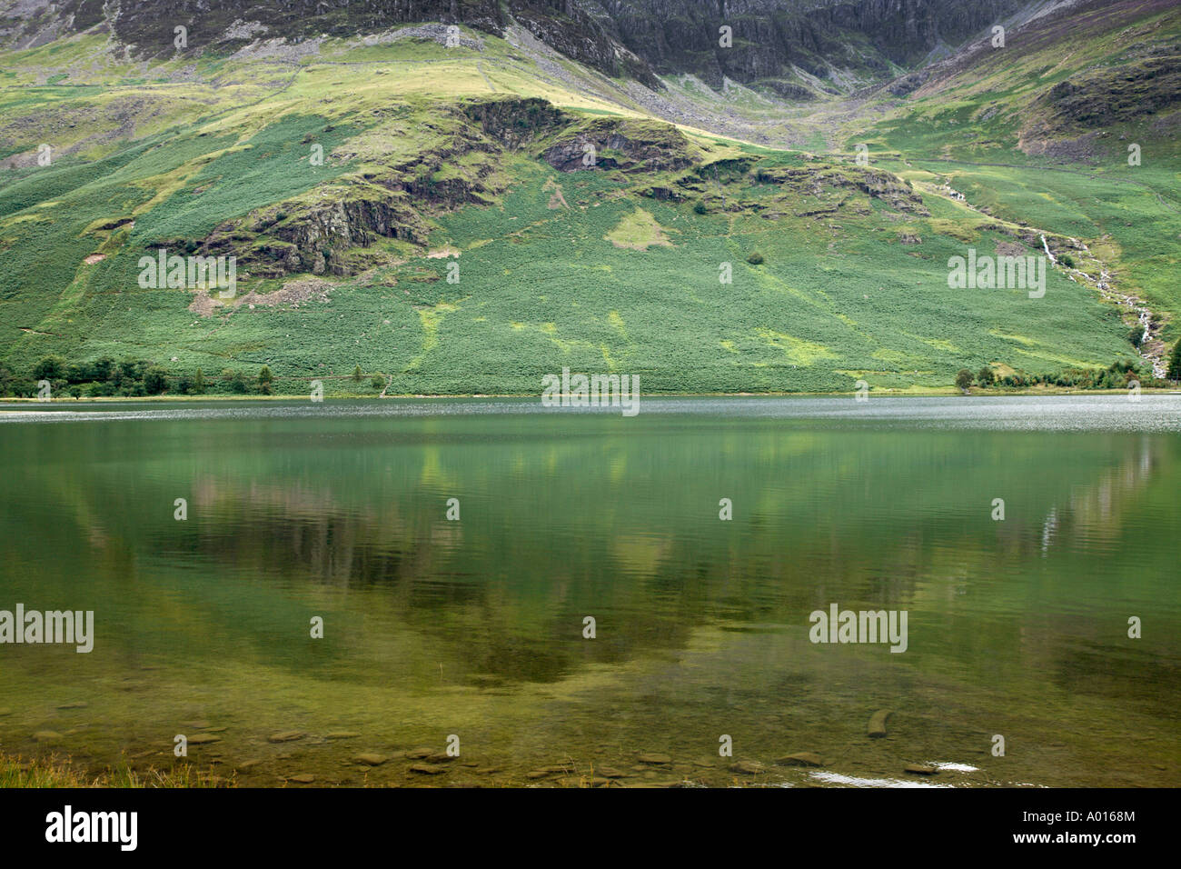 Buttermere, The High Mountains Around The Lake Reflected Back Onto The ...