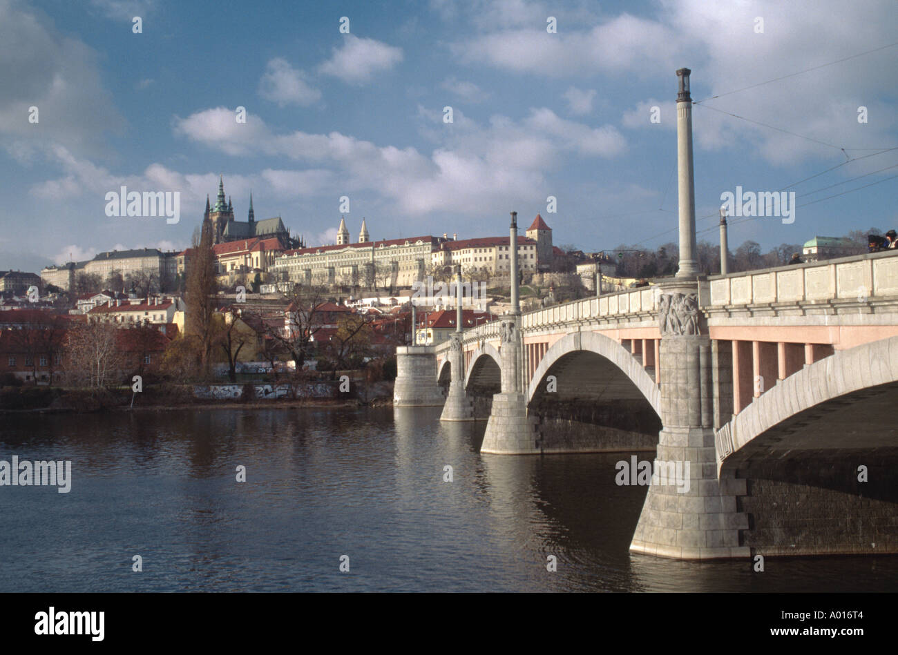 The MANESUV BRIDGE spans the VLTAVA RIVER below HRADCANY PRAGUE CASTLE ...